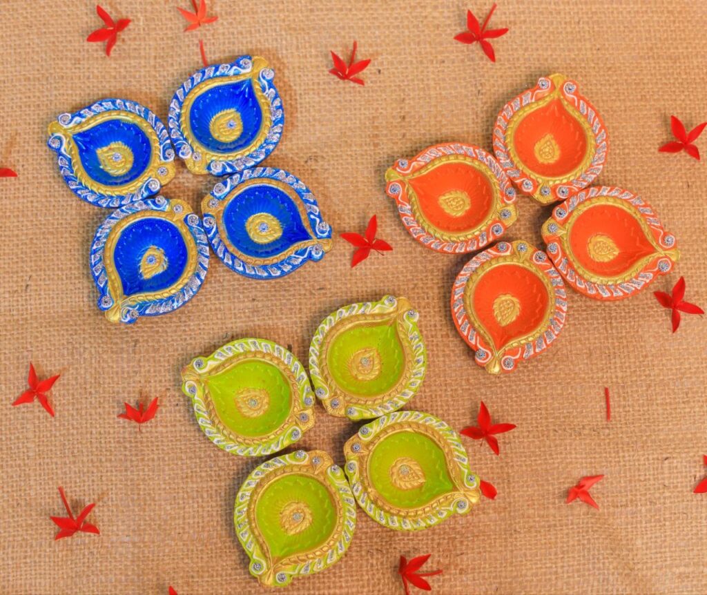 Diwakaram Artistic Clay Diya Collection | Set of 12 | Orange | Blue ...